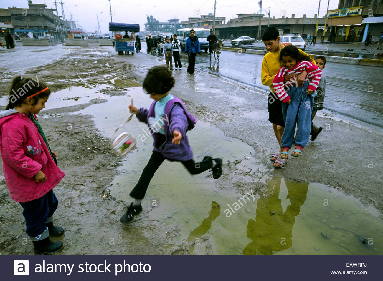 Jumping Over Puddle Stock Photos & Jumping Over Puddle Stock Images - Alamy