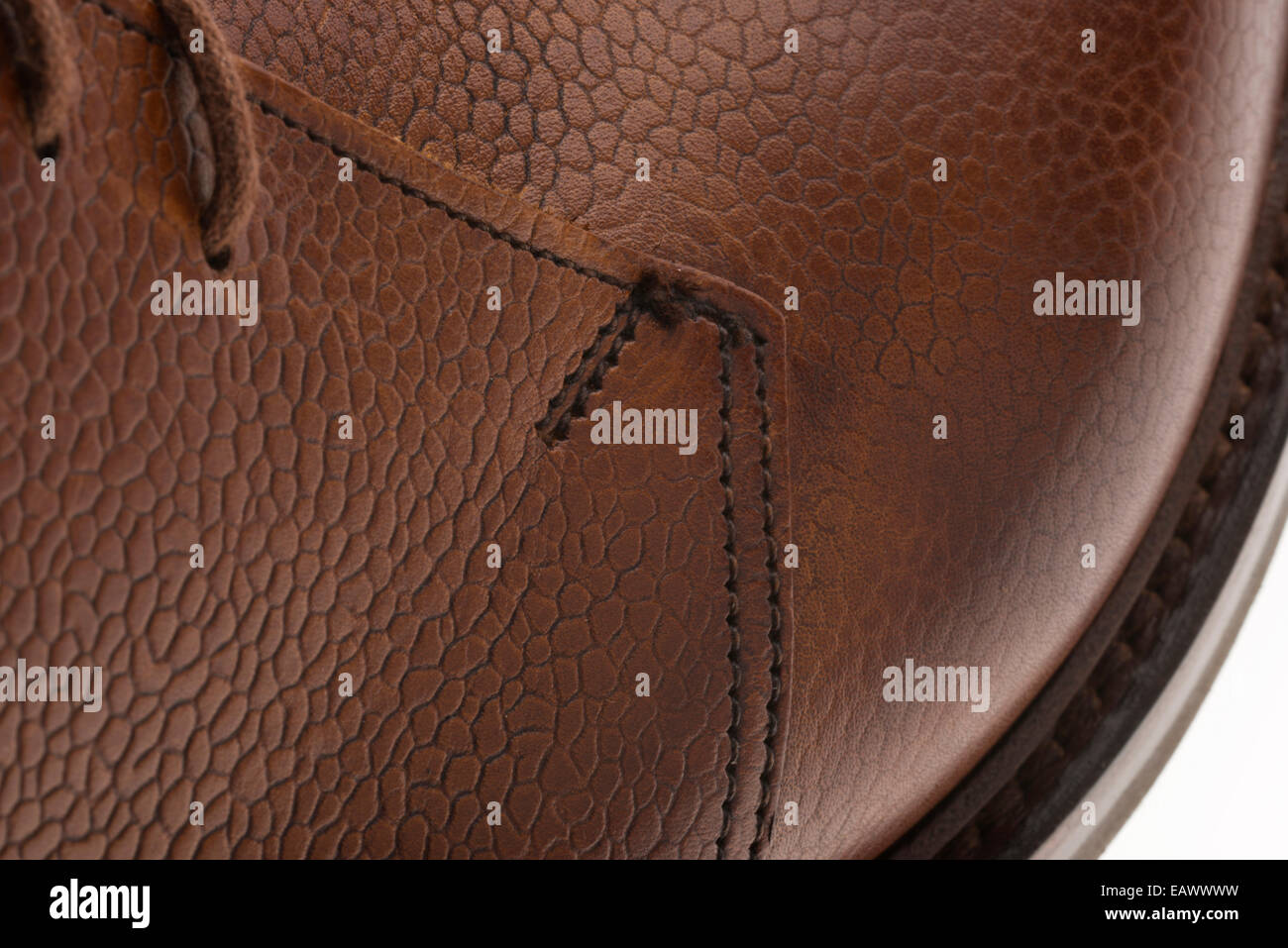 Side of rustic, textured shoe leather. Polished surface of English real ...