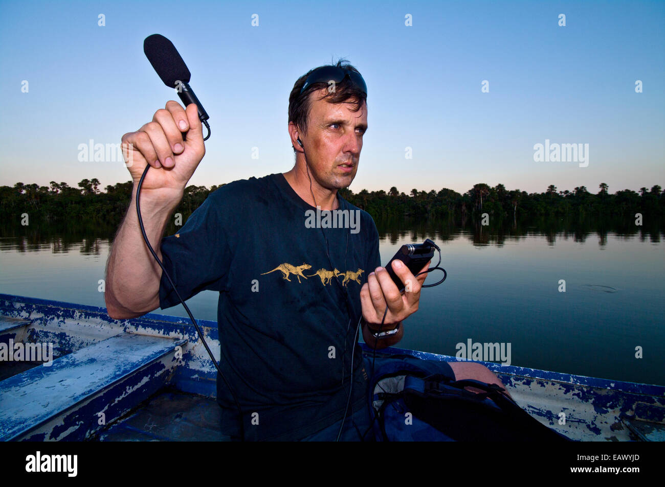 A wildlife conservationist and researcher records wildlife sounds on an ...