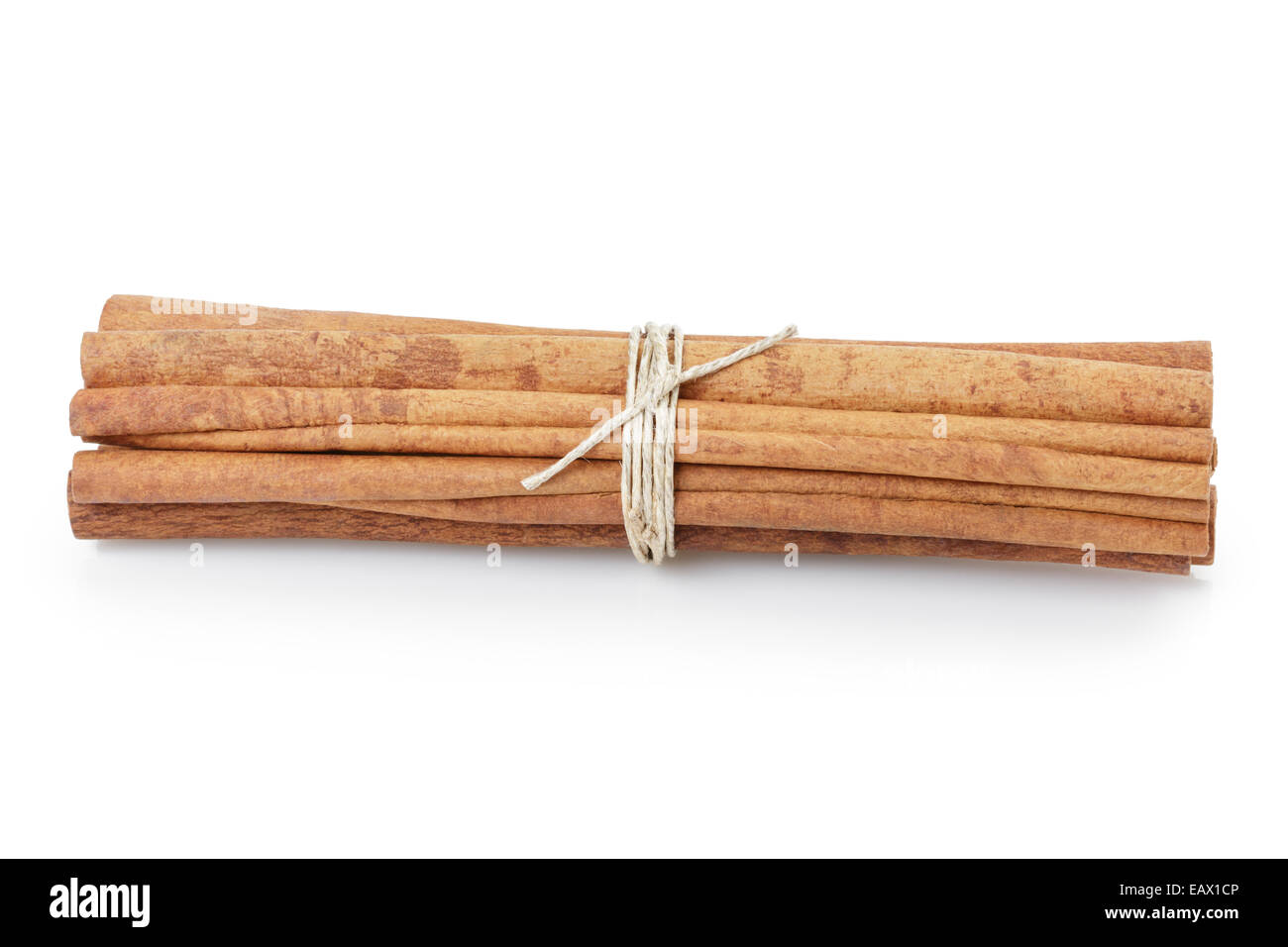 tied cinnamon cassia sticks, isolated on white background Stock Photo ...