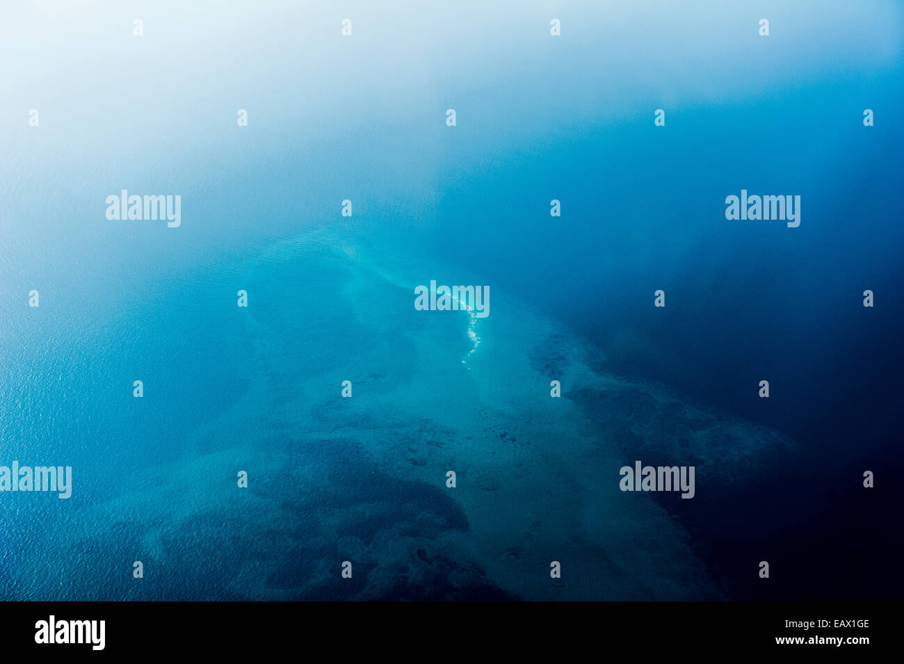 An aerial view of sea currents and a reef in the open ocean Stock Photo ...