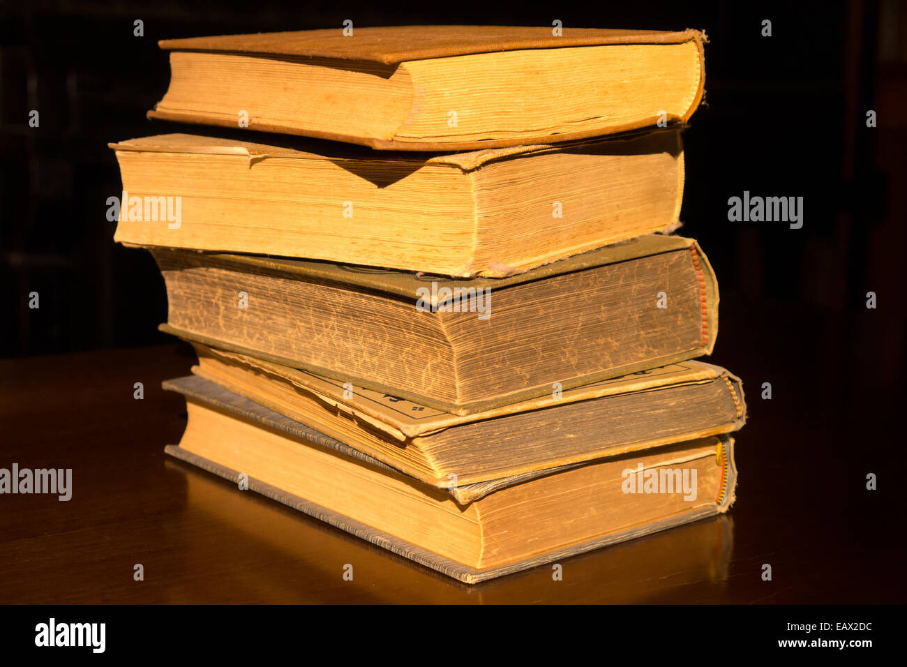 old books on wood table Stock Photo - Alamy