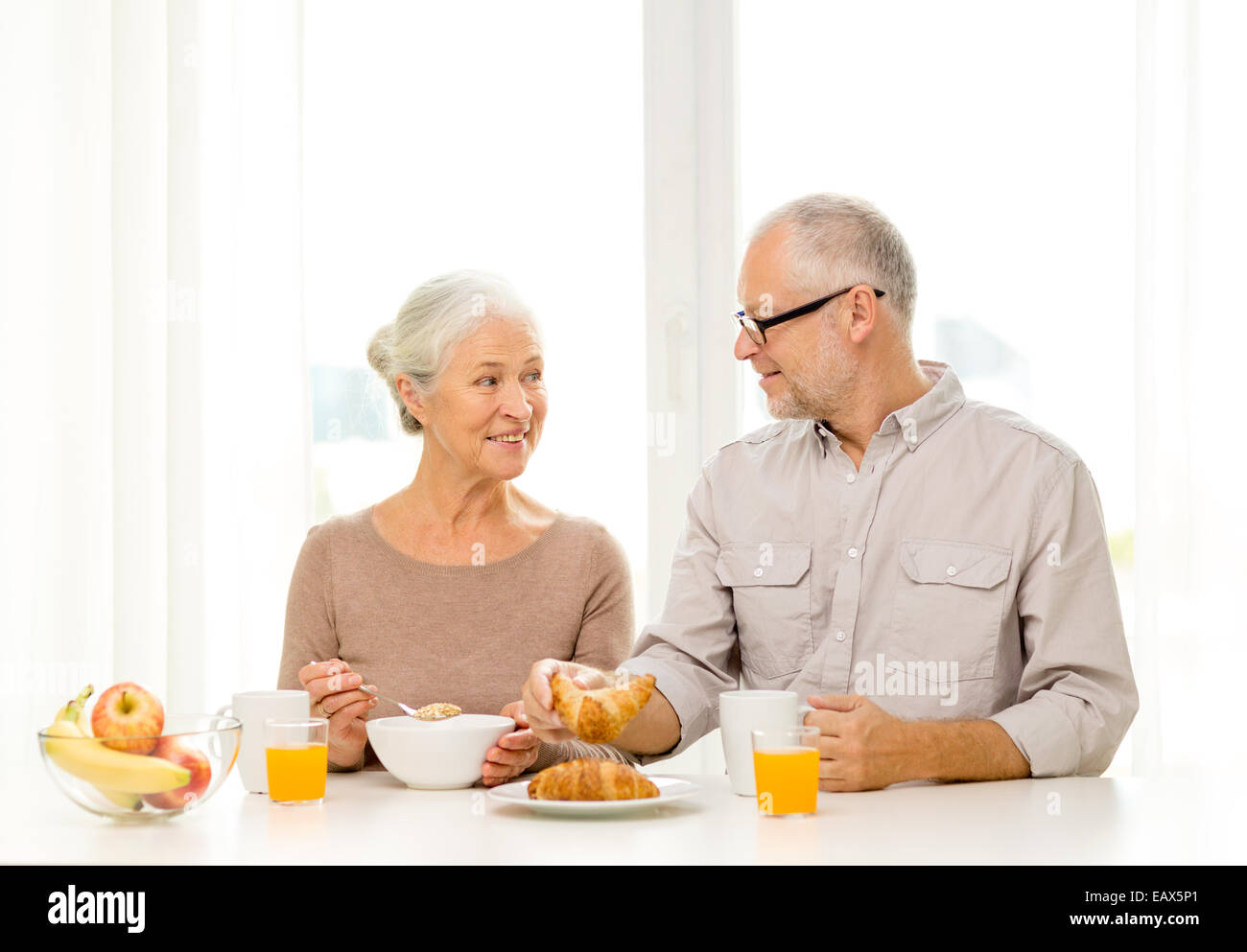 Mature family at home lifestyle Cut Out Stock Images & Pictures - Alamy