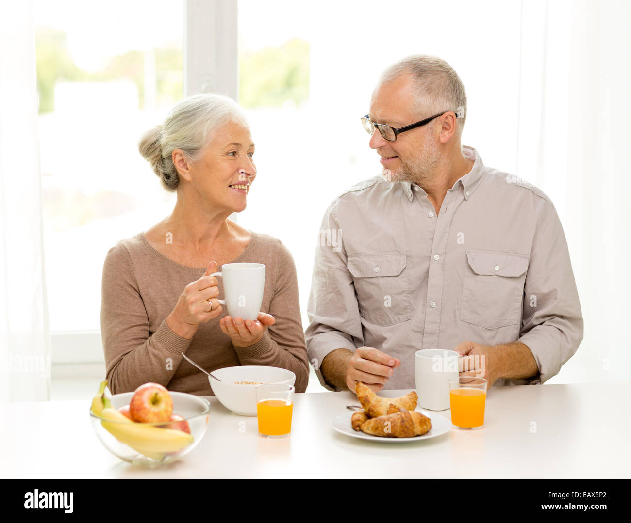 Elderly person eating breakfast Cut Out Stock Images & Pictures - Alamy