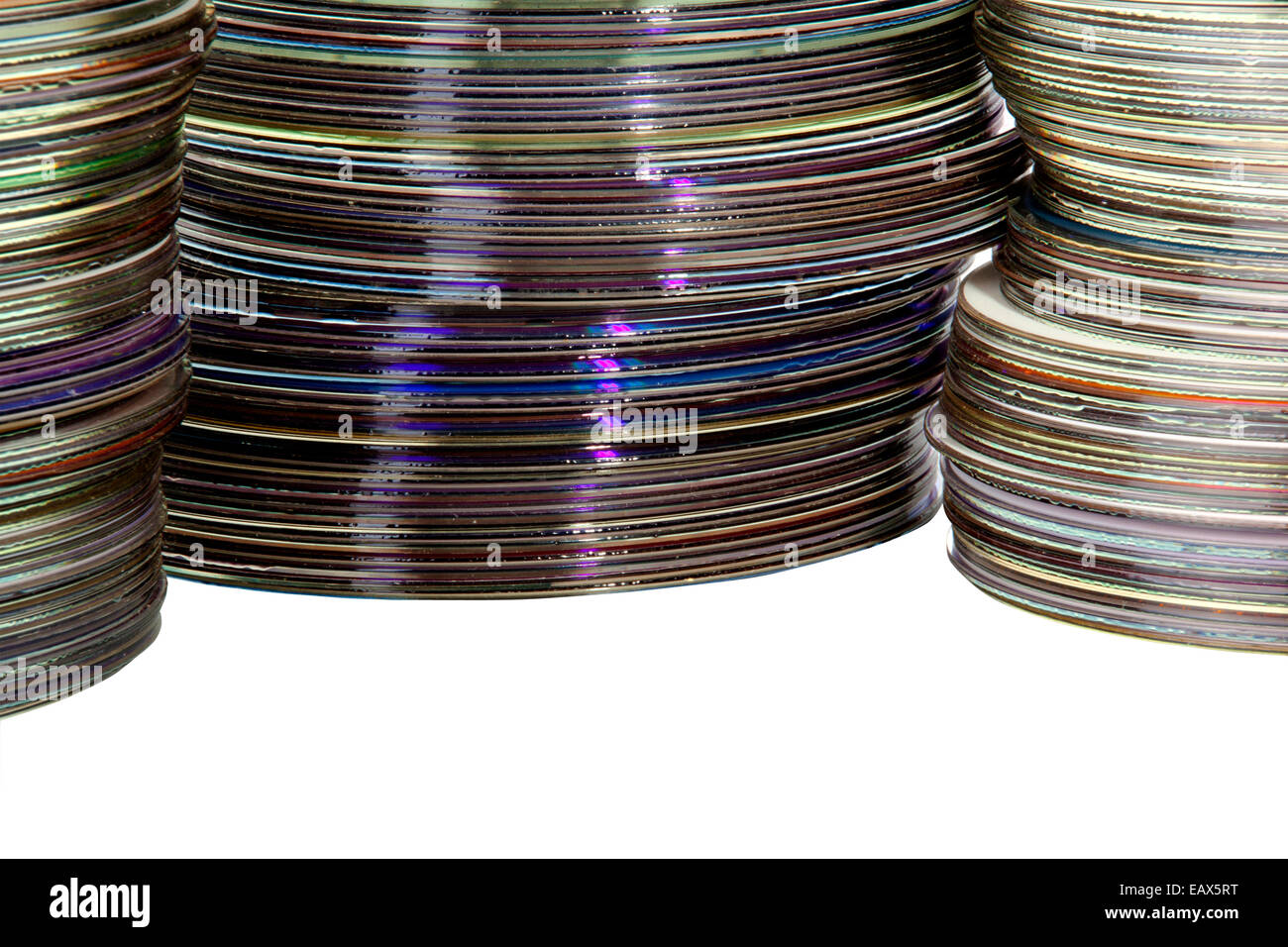 closeup three piles of colorful compact discs Stock Photo - Alamy
