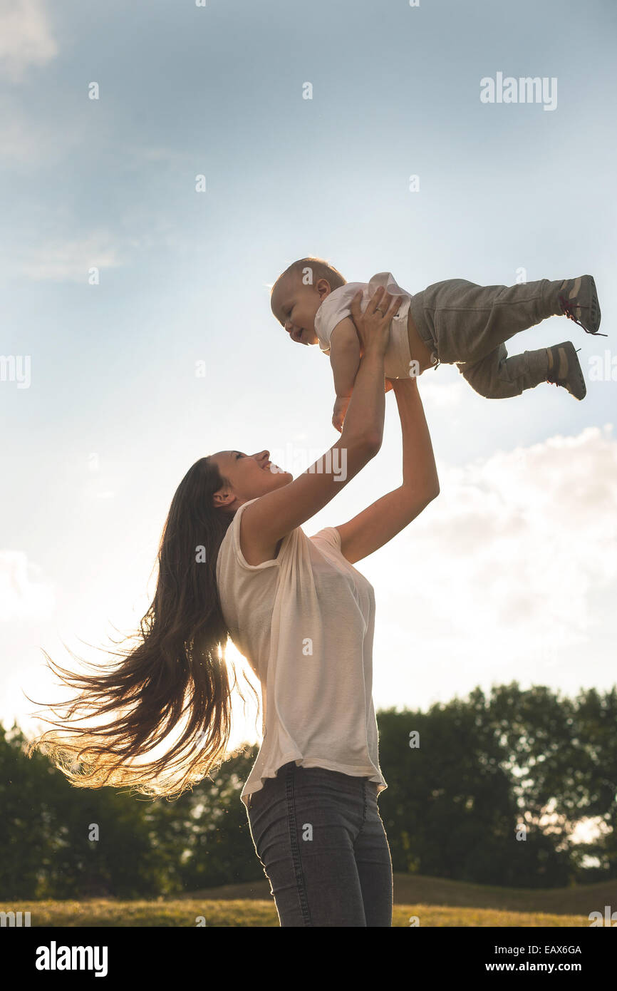 Baby with active mother hi-res stock photography and images - Alamy