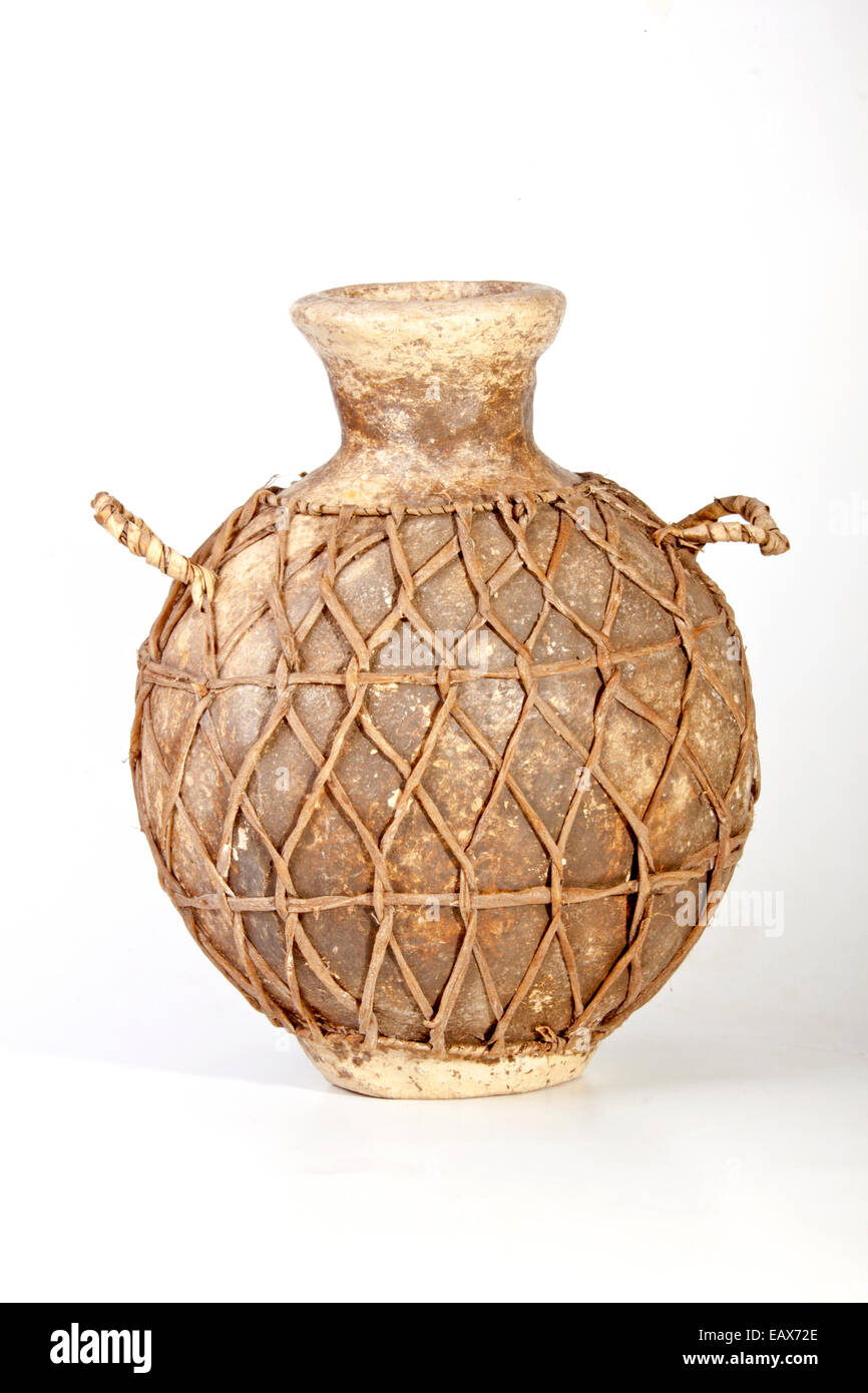 traditional African water pot with woven net carry handles Stock Photo ...