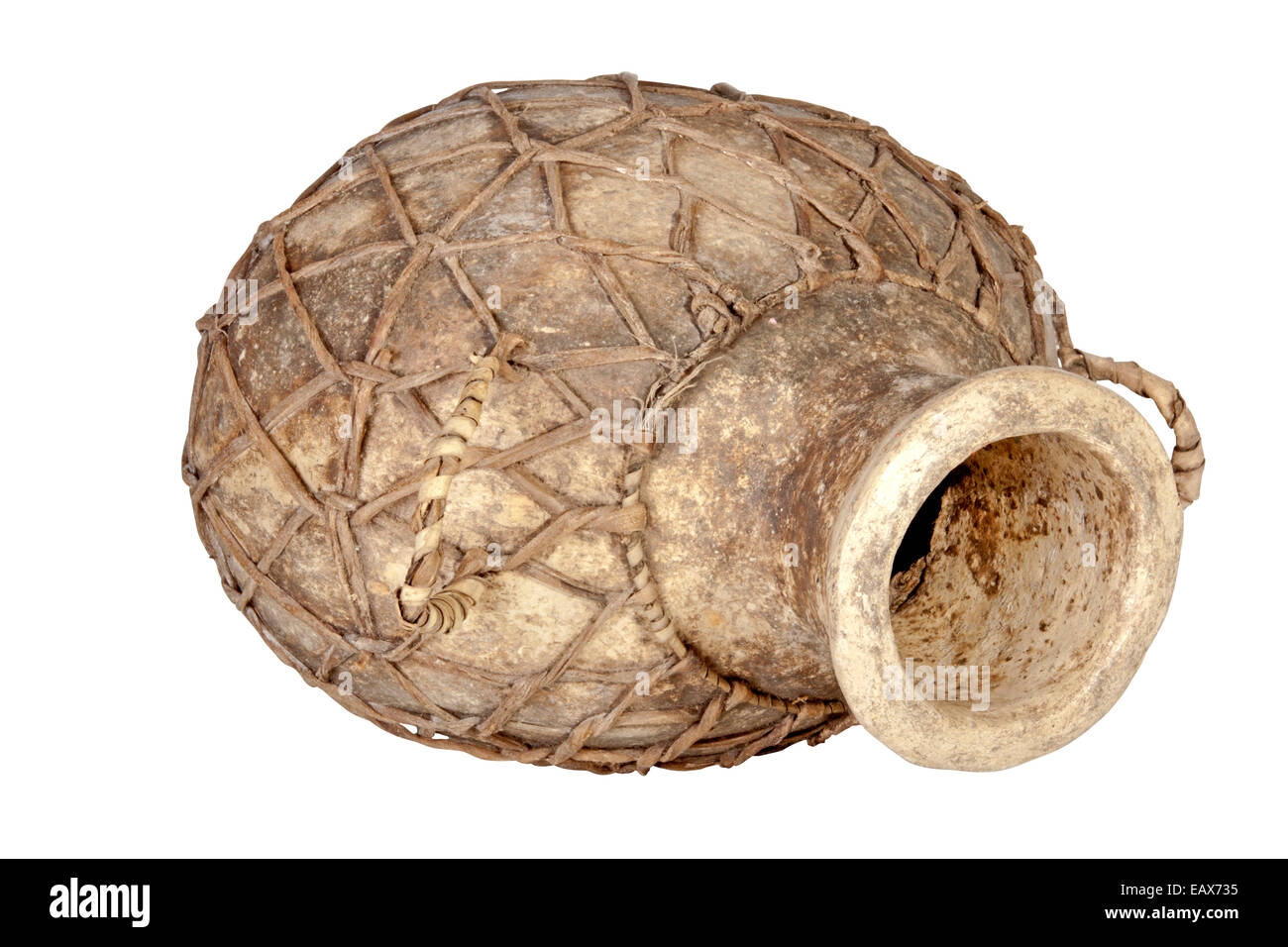 traditional african water pot with woven net covering Stock Photo - Alamy