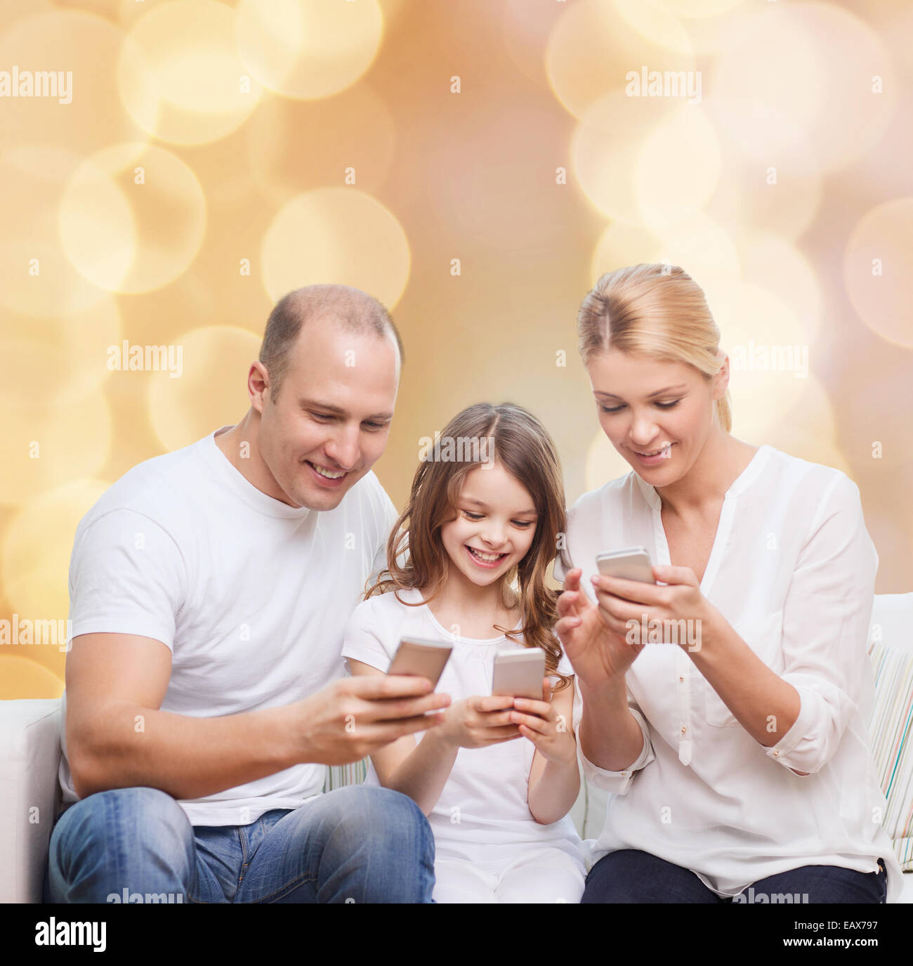 happy family with smartphones Stock Photo - Alamy
