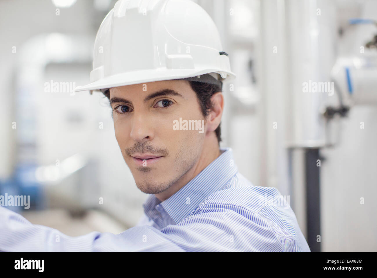Engineer at work in industrial plant, portrait Stock Photo - Alamy