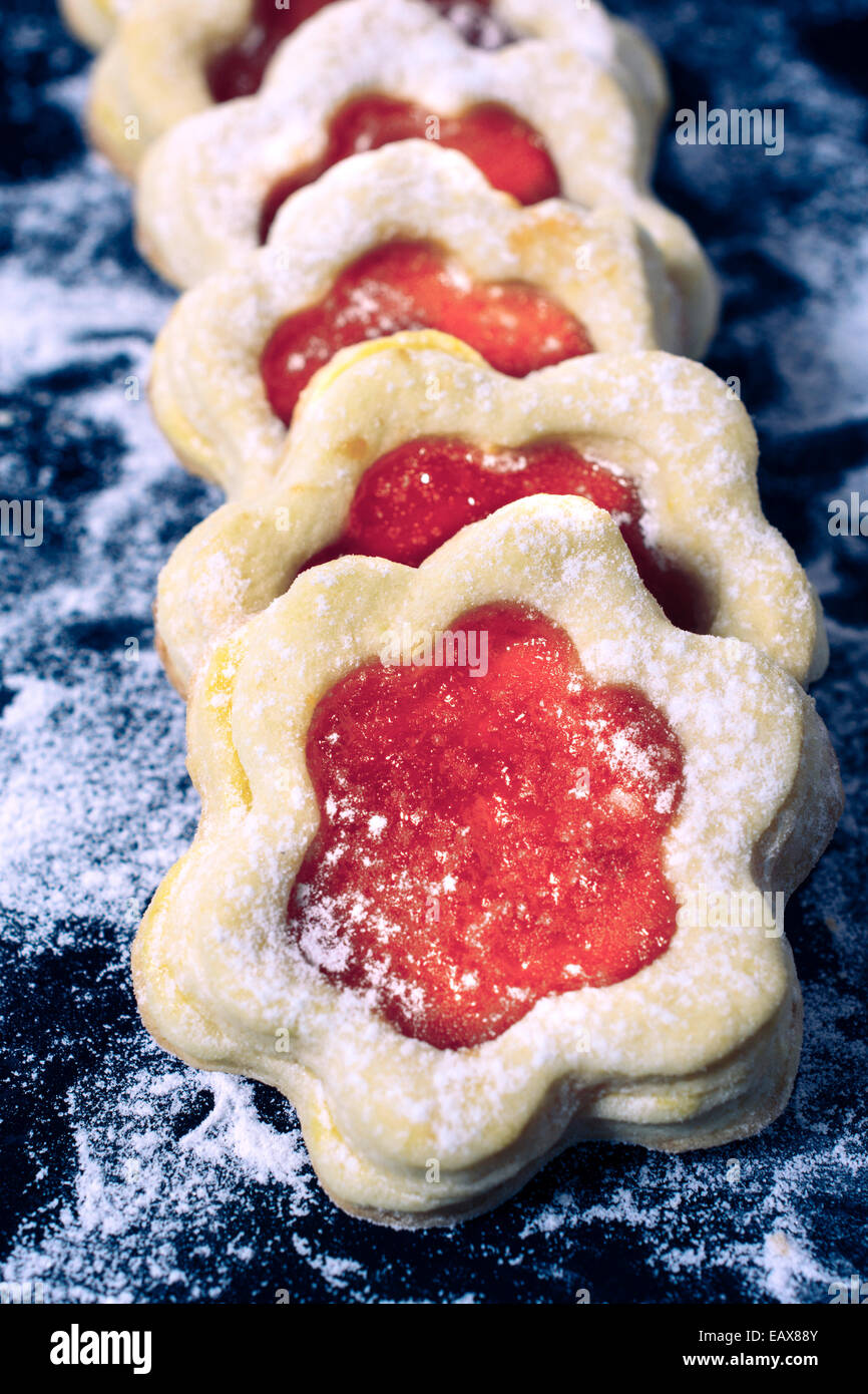 Red jam cookies with sugar icing on the top,selective focus Stock Photo ...