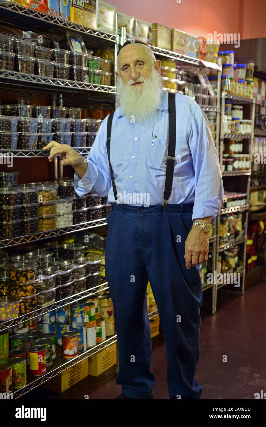 Religious Jewish owner of a small Kosher supermarket in the Crown ...