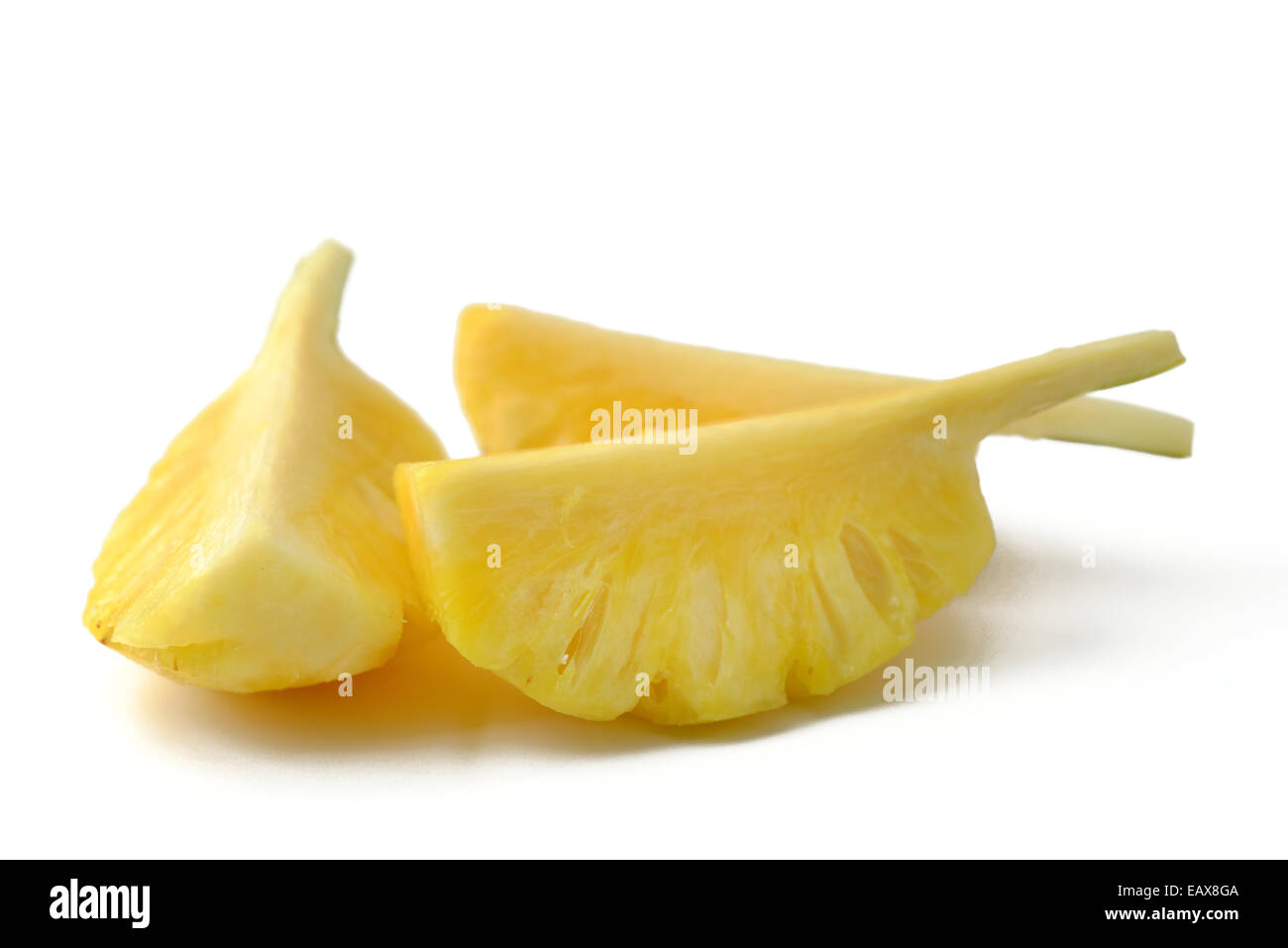 pineapple Chunks isolated on white Stock Photo - Alamy