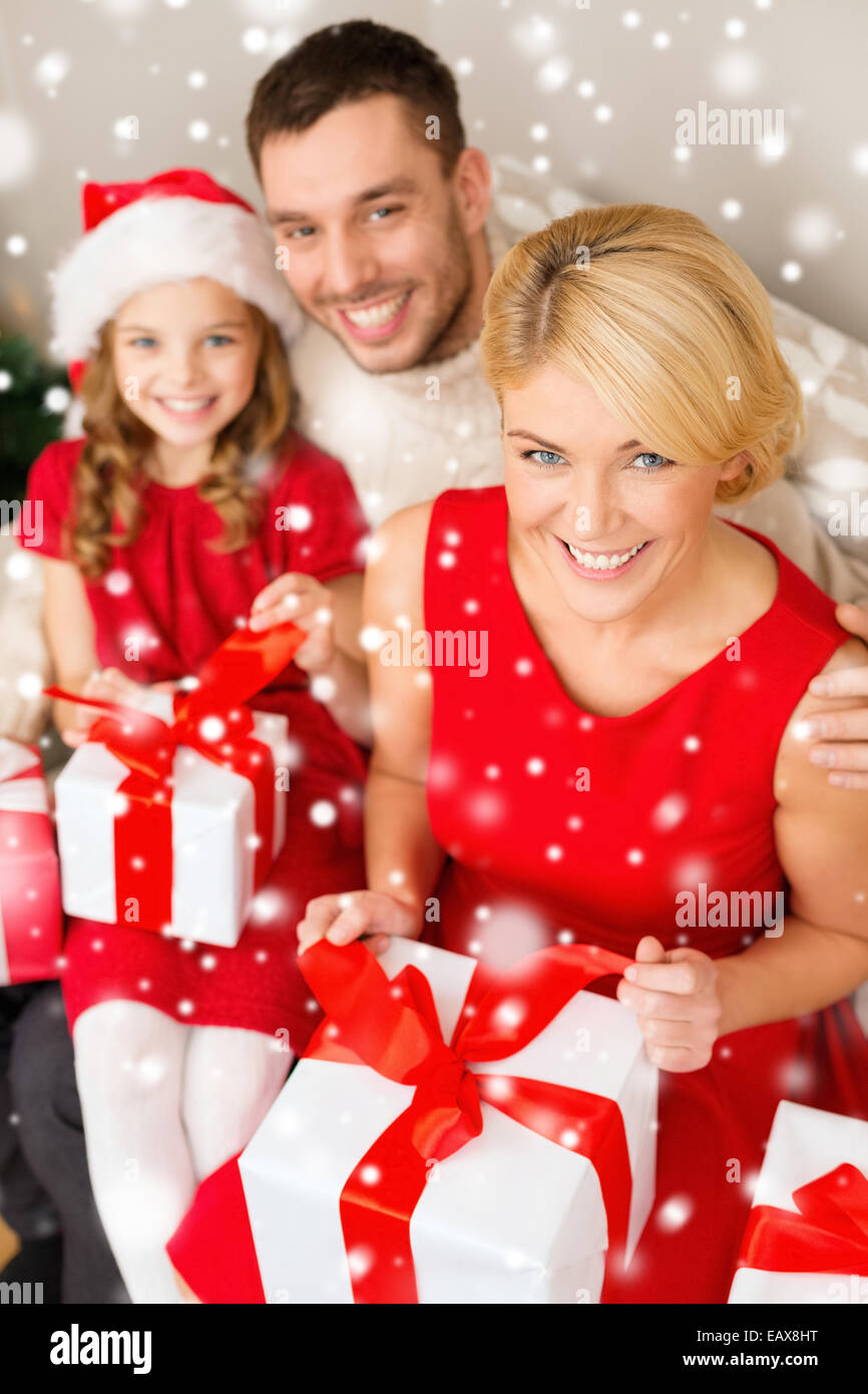 smiling family holding many gift boxes Stock Photo - Alamy