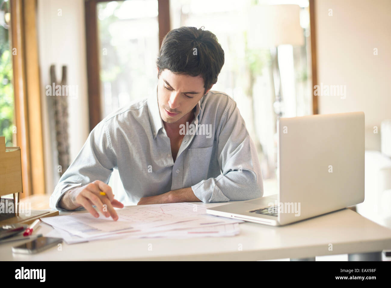 Officer worker working at desk Stock Photo - Alamy