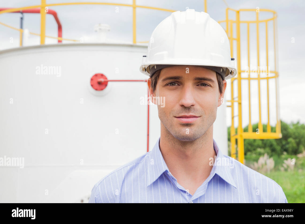 Engineer at industrial site, portrait Stock Photo - Alamy