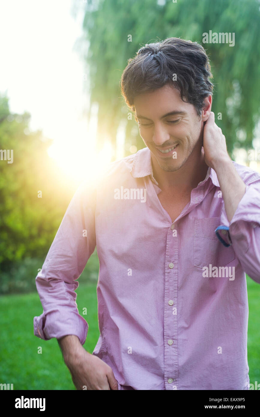 Man enjoying moment of self reflection during walk through park Stock ...
