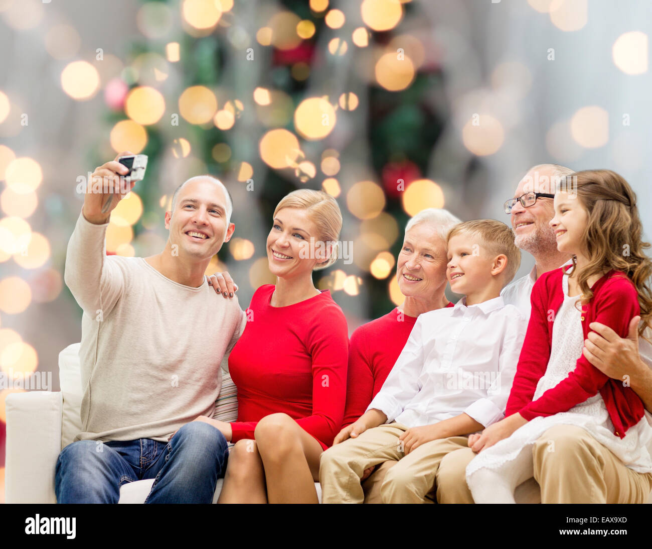smiling family with camera Stock Photo - Alamy