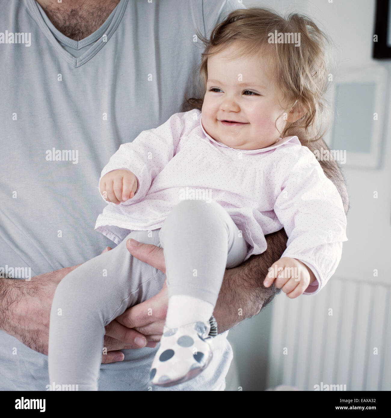 Hold baby in arms hi-res stock photography and images - Alamy