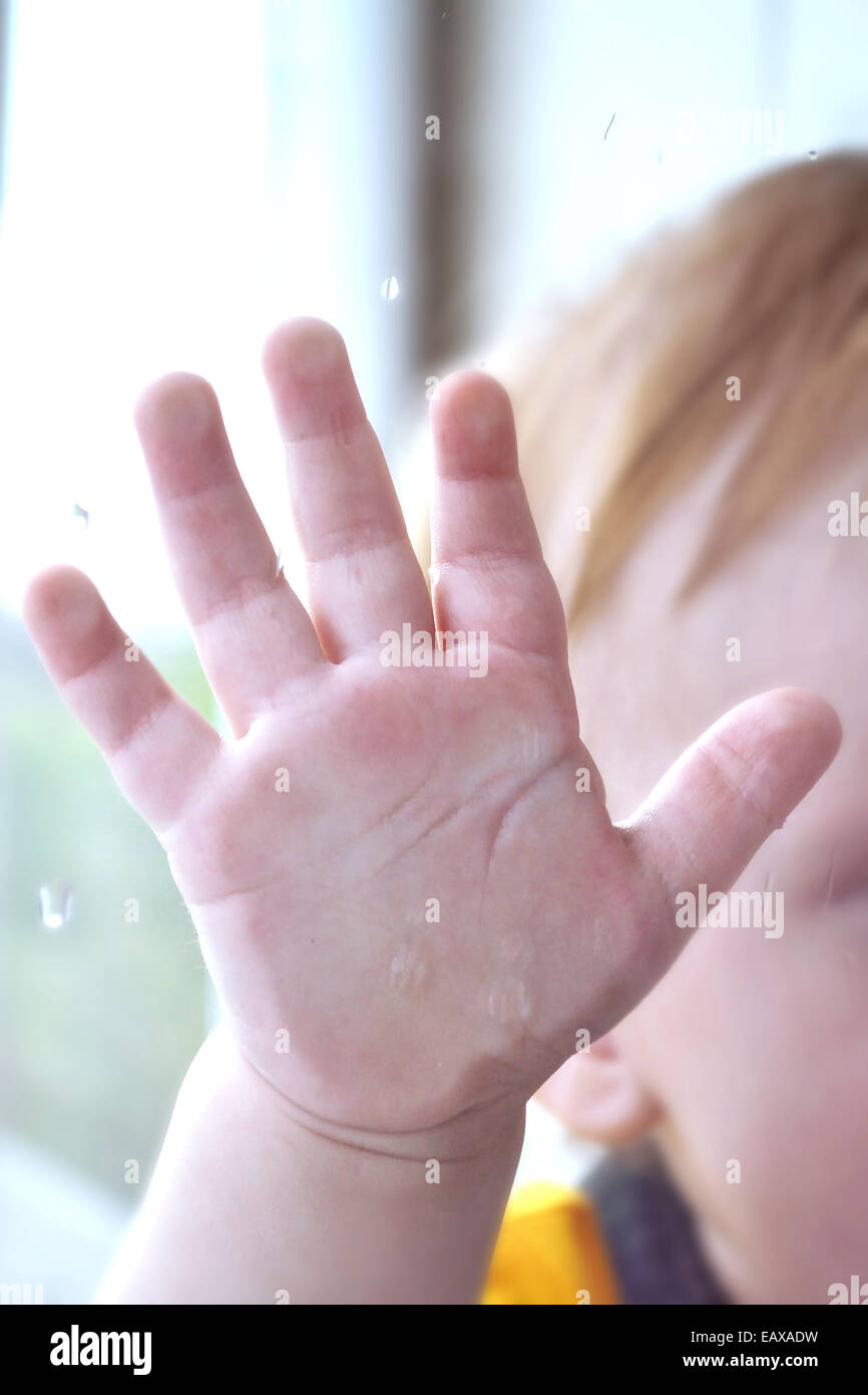 Child`s hand seen through the window Stock Photo - Alamy
