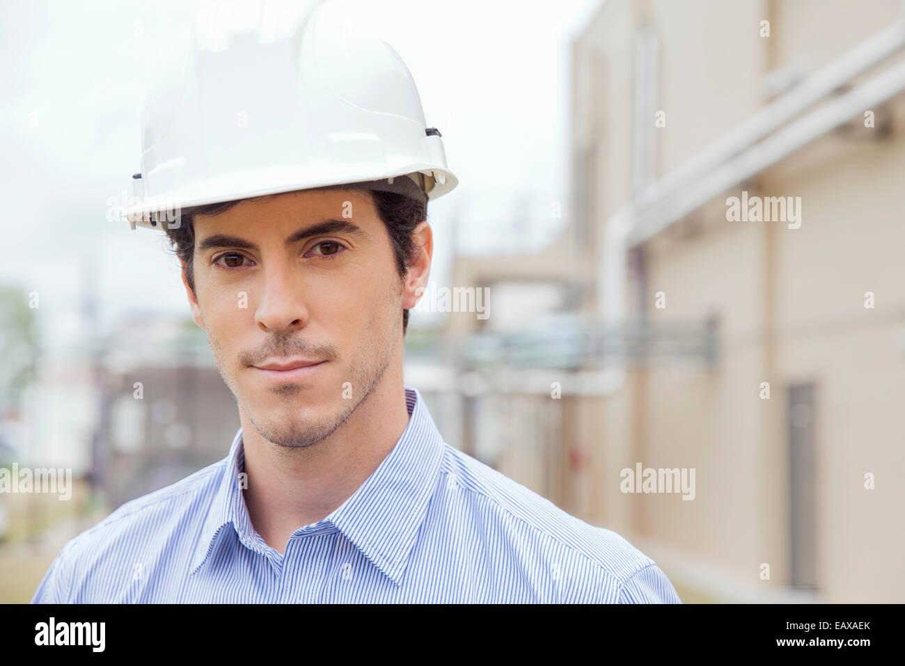 Engineer at industrial site, portrait Stock Photo - Alamy