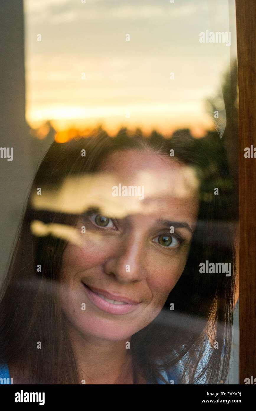 Woman reflected window hi-res stock photography and images - Alamy