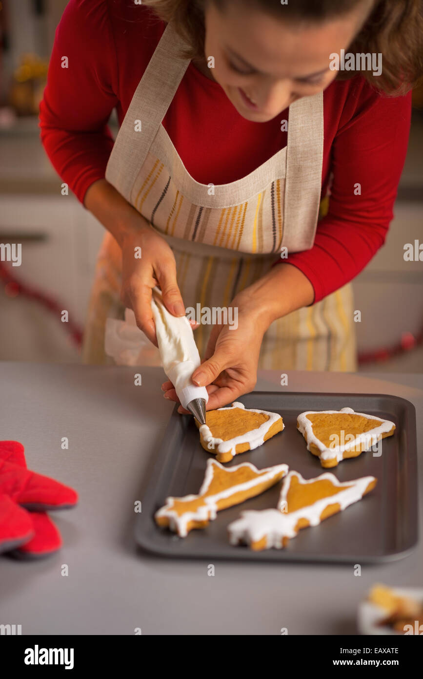 Closeup on young housewife making christmas cookies Stock Photo - Alamy