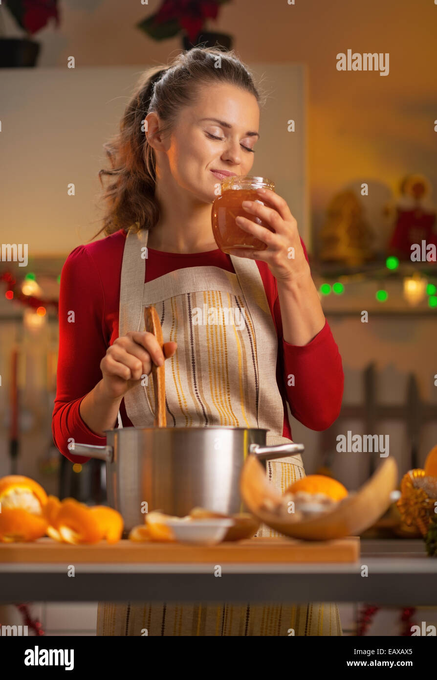 Woman making jam in kitchen hi-res stock photography and images - Alamy