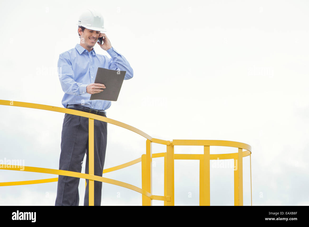 Top view engineer looking phone hi-res stock photography and images - Alamy