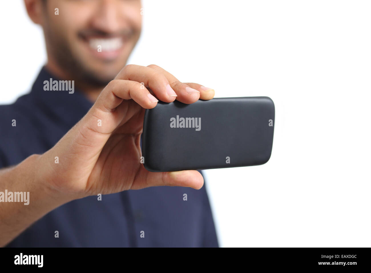 Closeup of a man hand watching video in a smart phone isolated on a ...