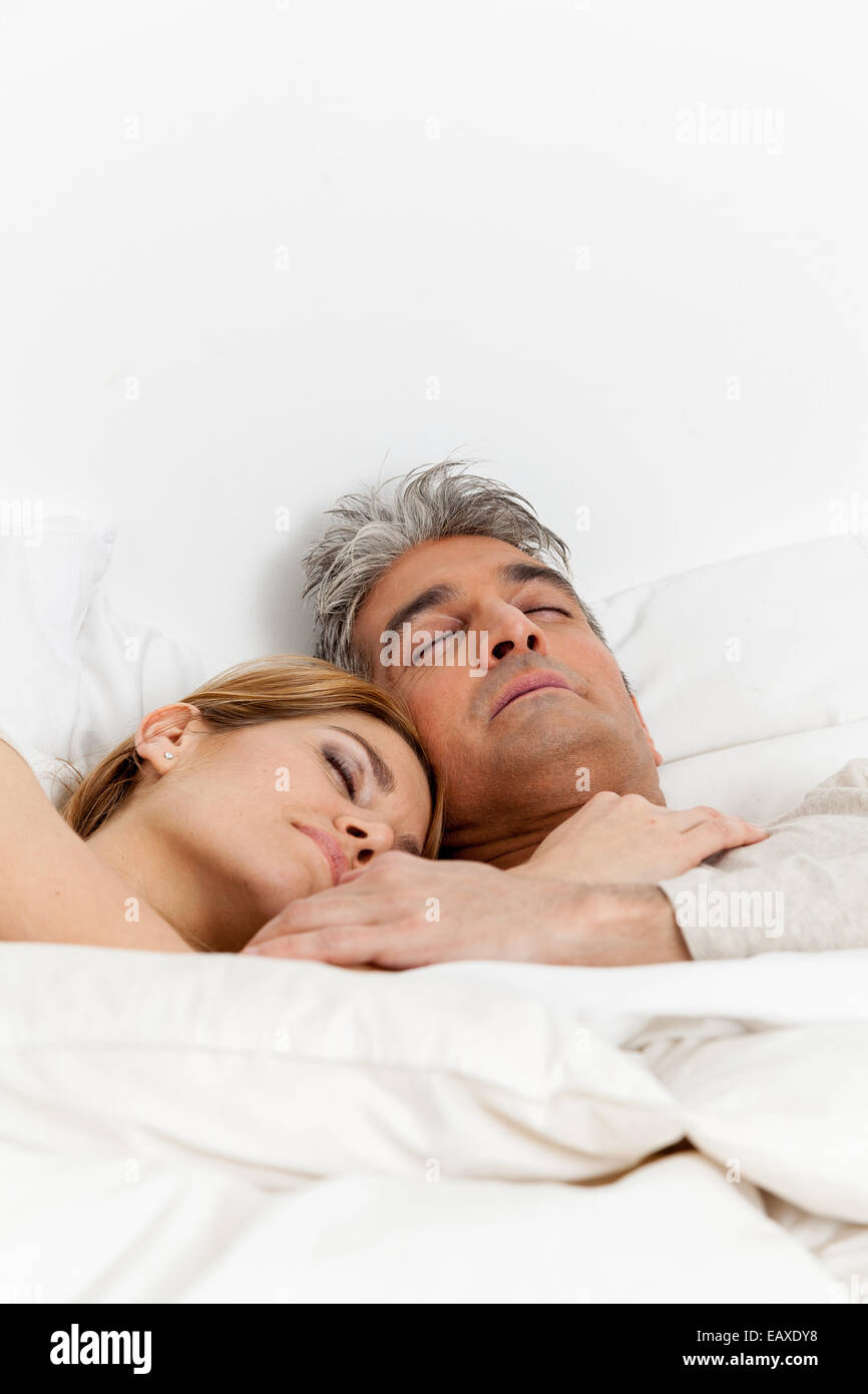 Pacific couple sleeping together Stock Photo - Alamy