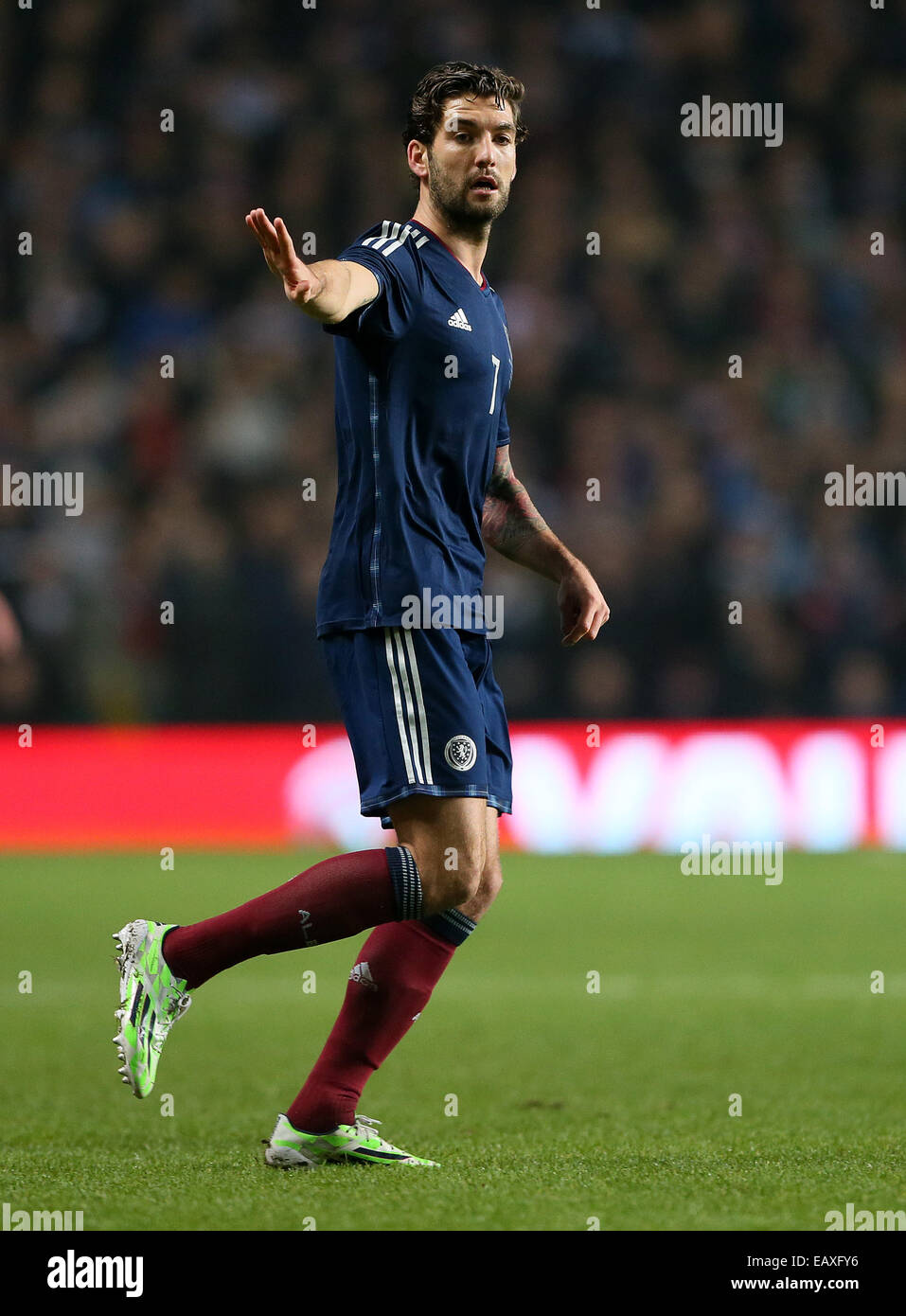 Glasgow, UK. 18th Nov, 2014. Scotland's Charlie Mulgrew in action ...