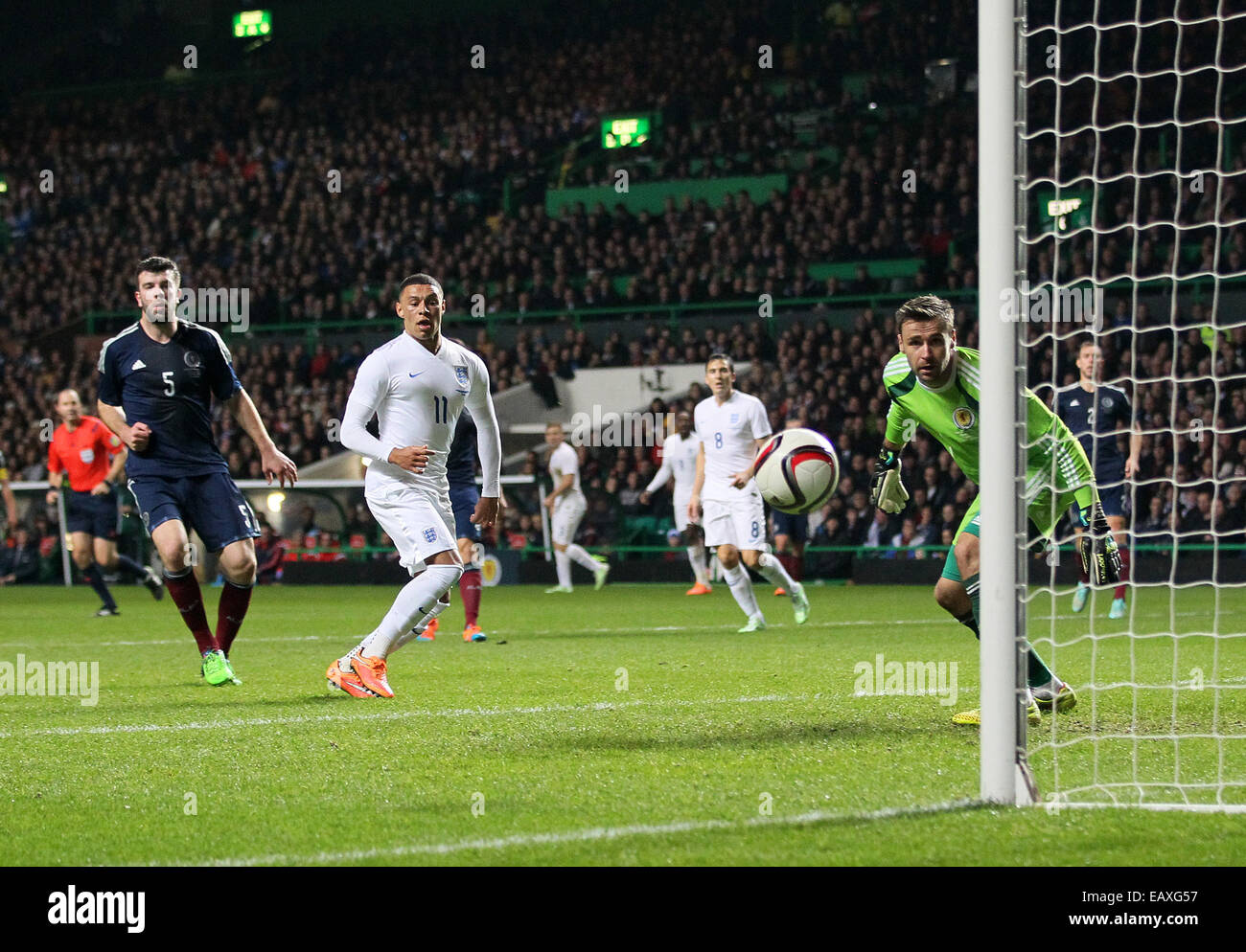 Glasgow, UK. 18th Nov, 2014. England's Alex Oxlade-Chamberlain scoring ...