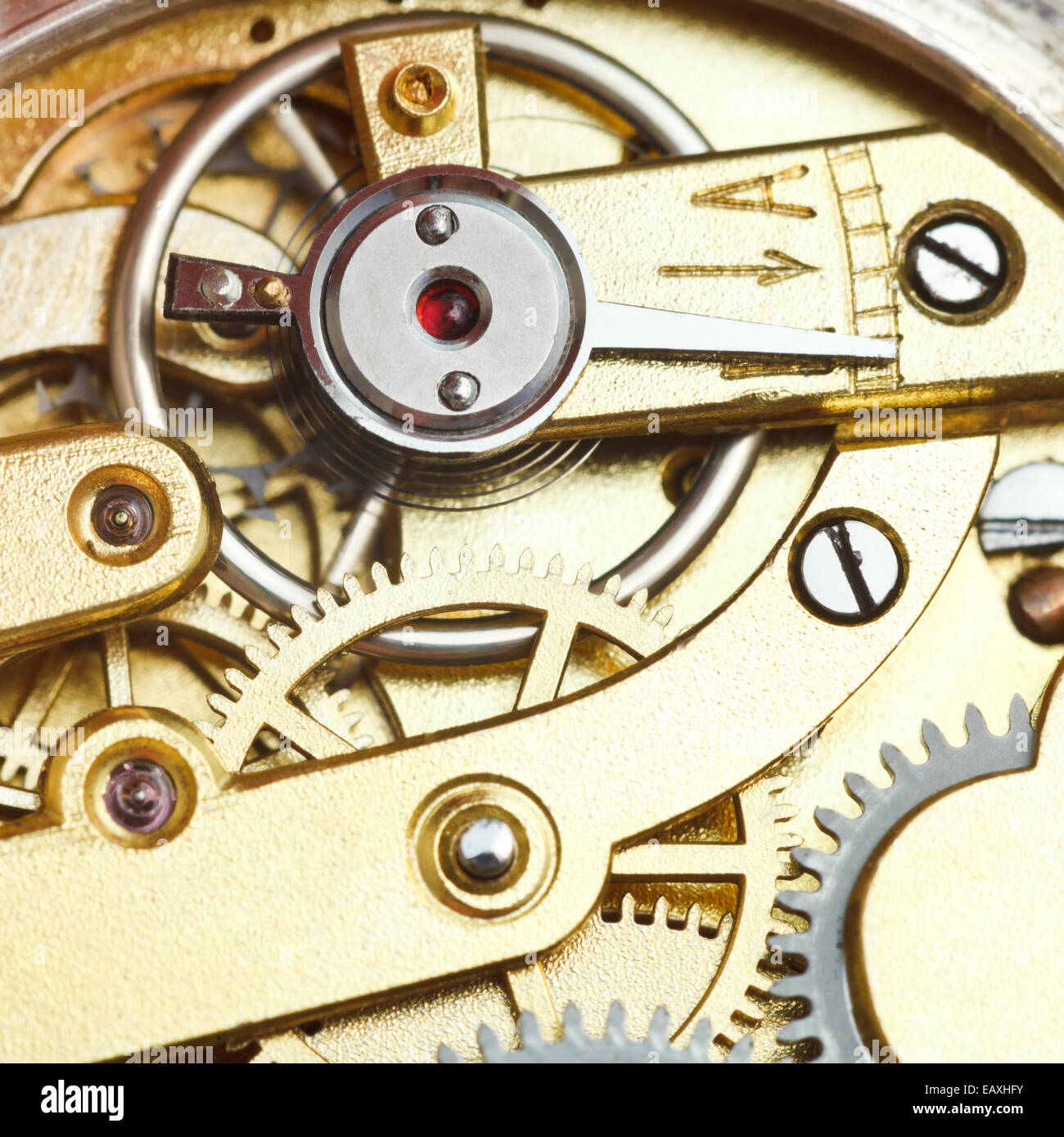 brass mechanical clockwork of retro watch close up Stock Photo - Alamy
