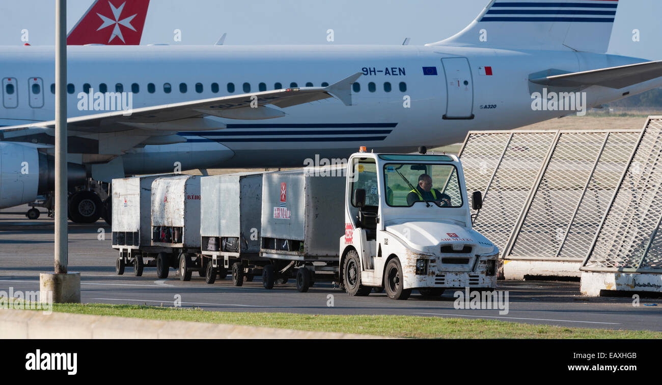 Unloading cargo at Malta International Airport, Valletta, Malta Stock ...