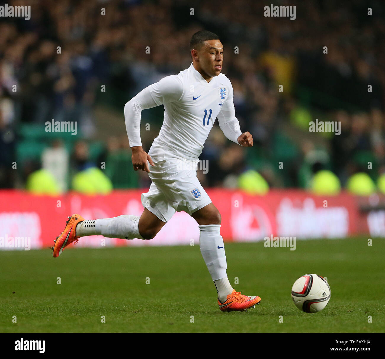 Englands alex oxlade chamberlain in action hi-res stock photography and ...