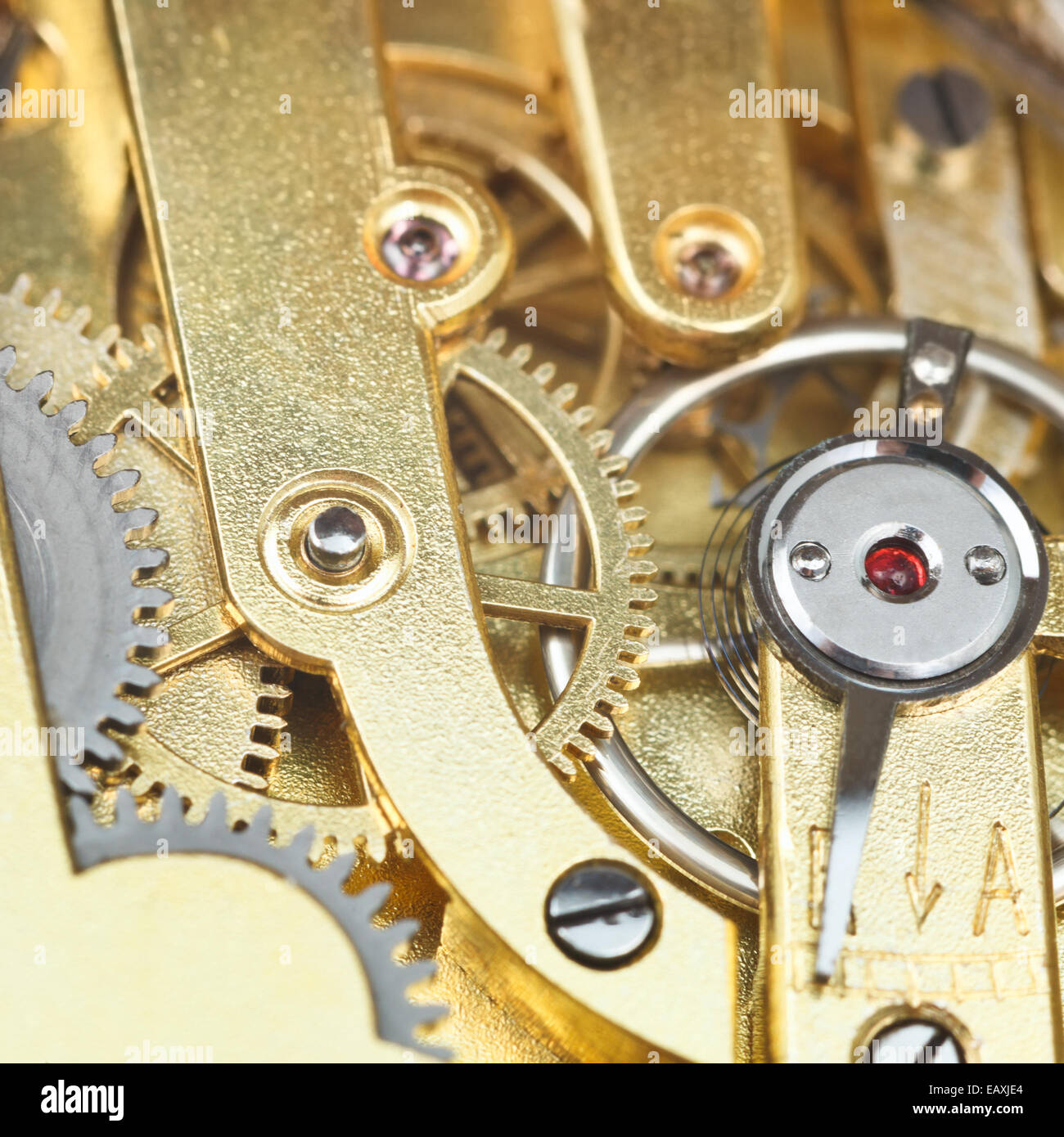 brass mechanical clockwork of vintage watch close up Stock Photo - Alamy
