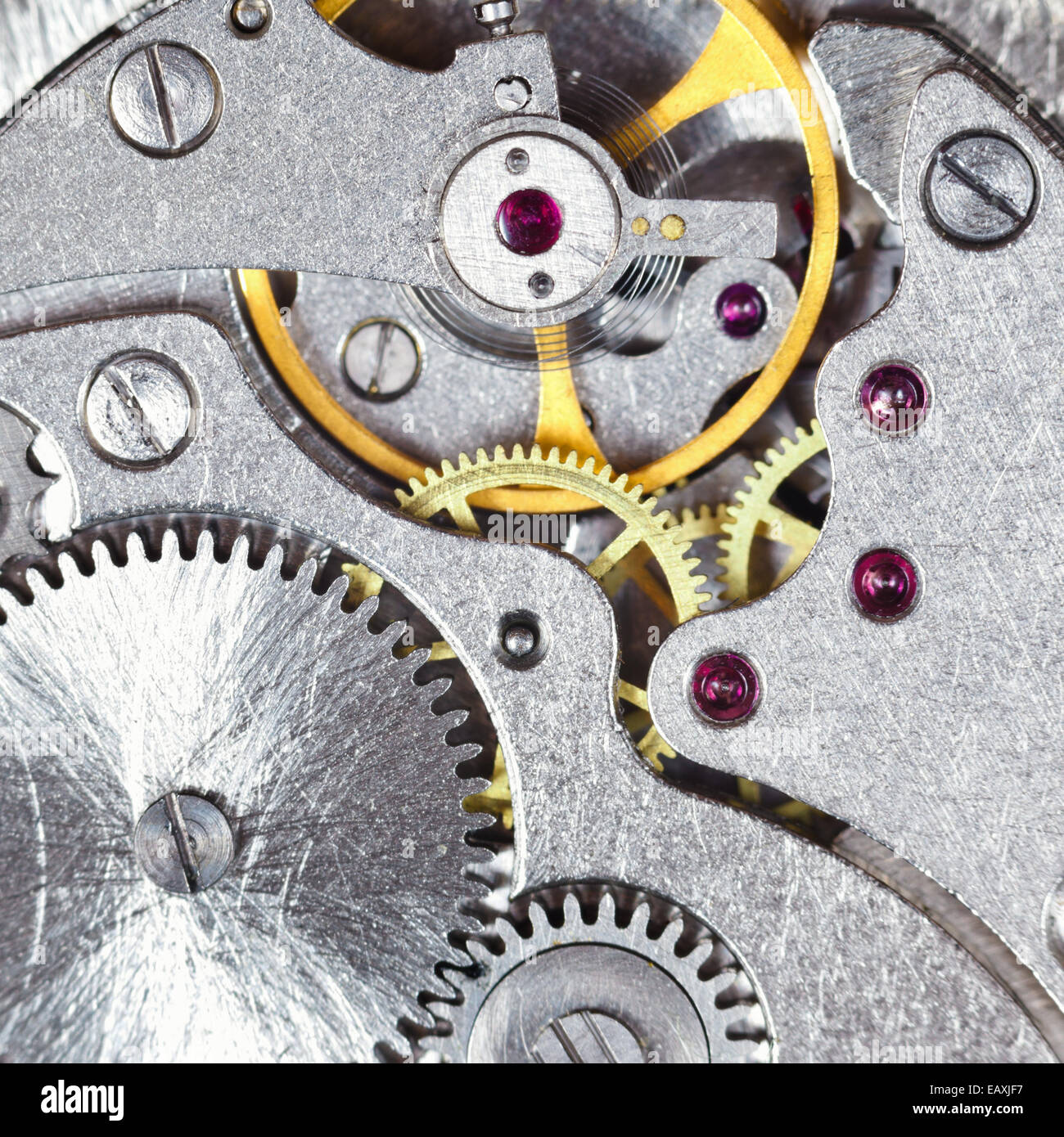 background from steel mechanical clockwork of retro watch close up ...