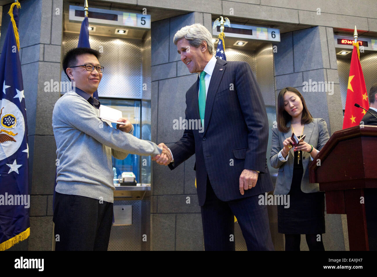 Yang Bo, an IBM employee from China, displays a 10-year business and ...
