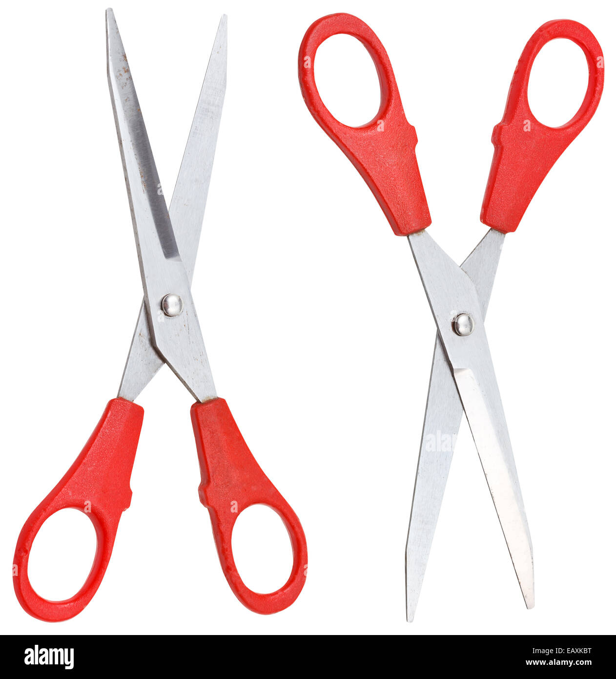 two standard scissors with red handles isolated on white background ...