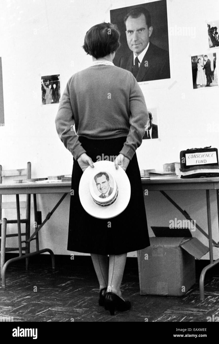 This black-and-white photograph from Tallahassee shows a woman viewing ...