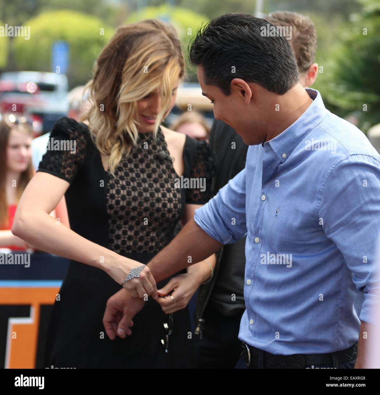 Sophia Bush and Jesse Lee Soffer appear on Extra hosted by Mario Lopez ...