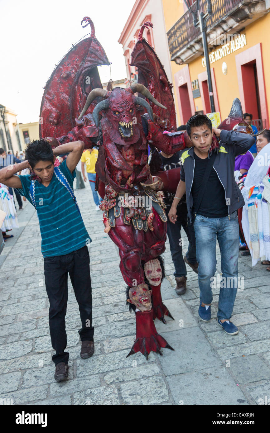 Man dressed in an American style devil costume during the Day of the ...