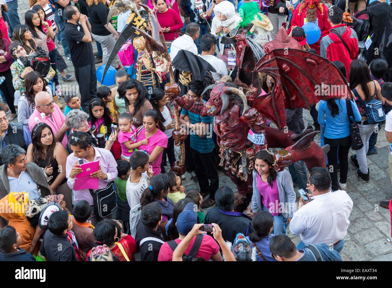 Man dressed in an American style devil costume during the Day of the ...