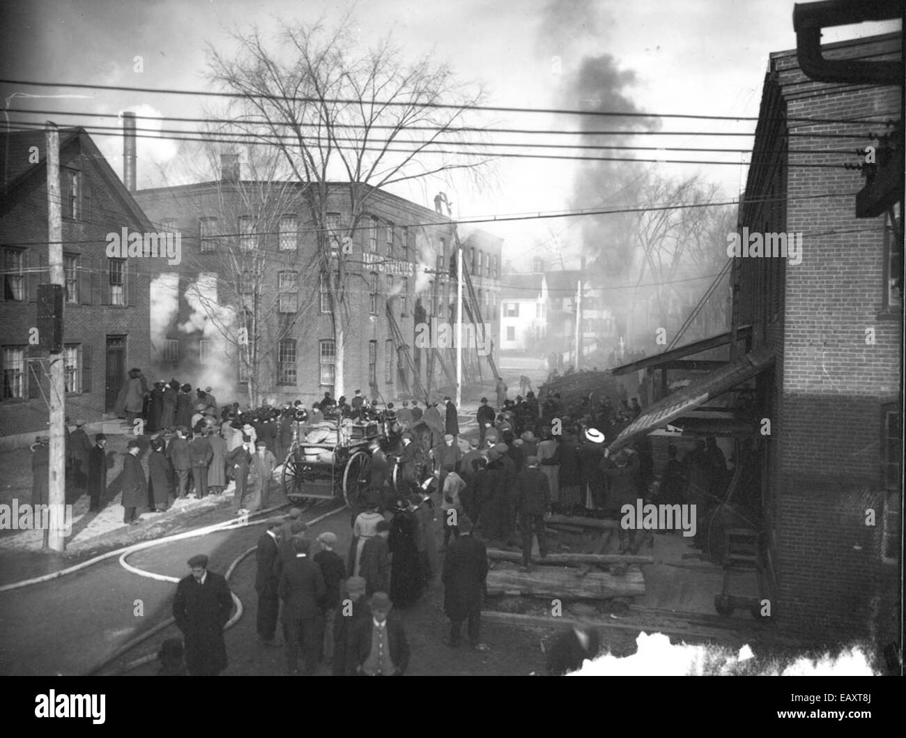 This photograph captures the aftermath of a fire at the Impervious ...