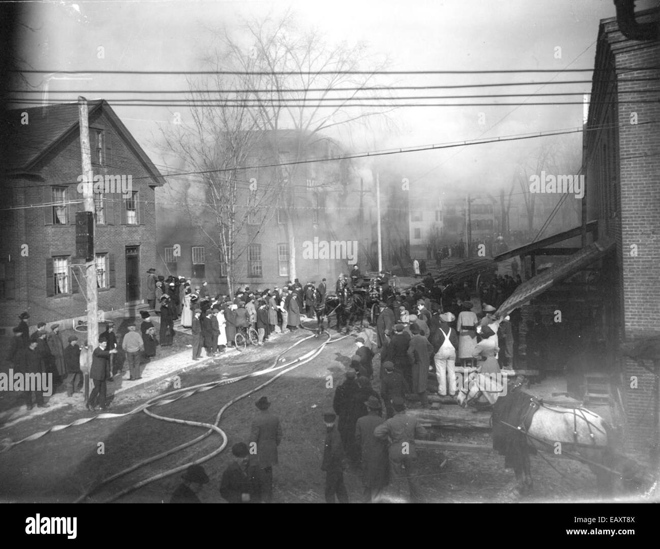 A 20th-century photograph captures the aftermath of a fire at the ...
