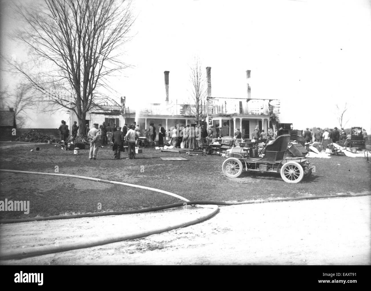 The painting 'Fire at 3-chimneyed house' by Bion Whitehouse depicts a ...