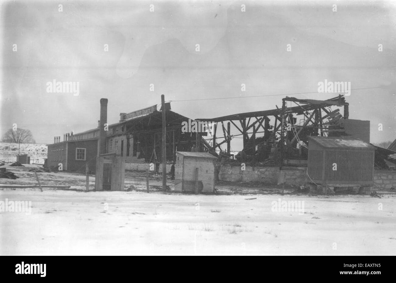 A photograph capturing the fire at the Victoria White Granite Company ...