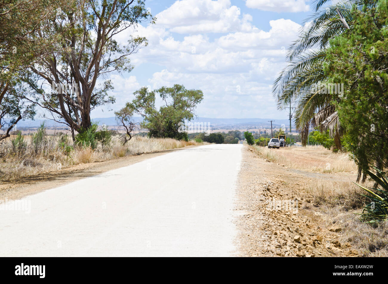 Roadworks.Lime spread on road to mix with base aggregate prior to ...