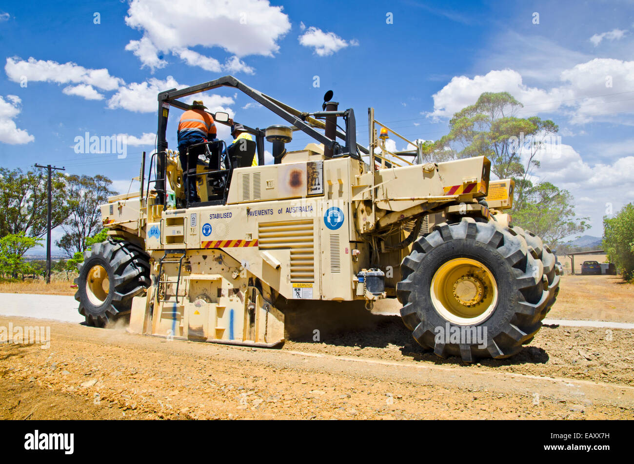 A CMI RS500 Stabilizer pulverizes and blends lime and aggregate ...